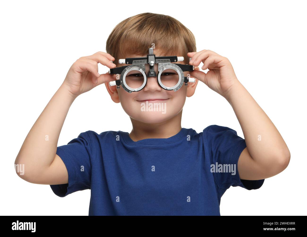 Vision testing. Little boy with trial frame on white background Stock ...