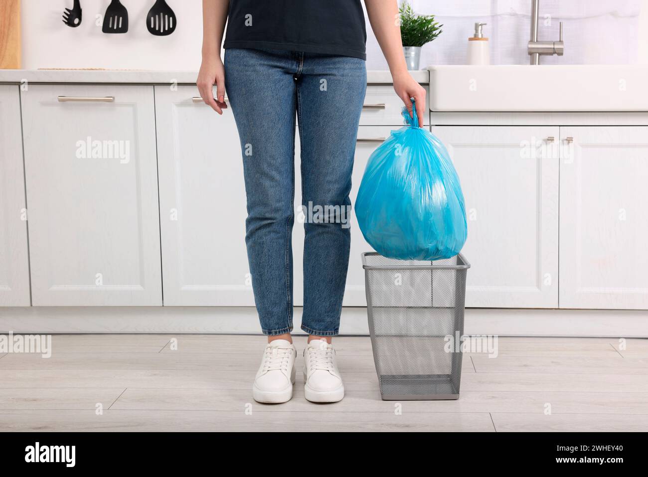 Taking out rubbish female hi-res stock photography and images - Alamy