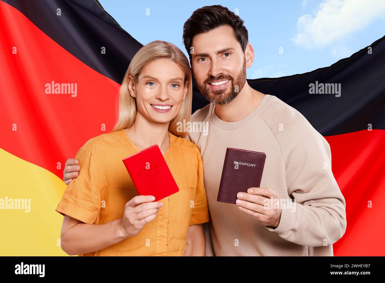Immigration. Happy couple with passports and national flag of Italy ...
