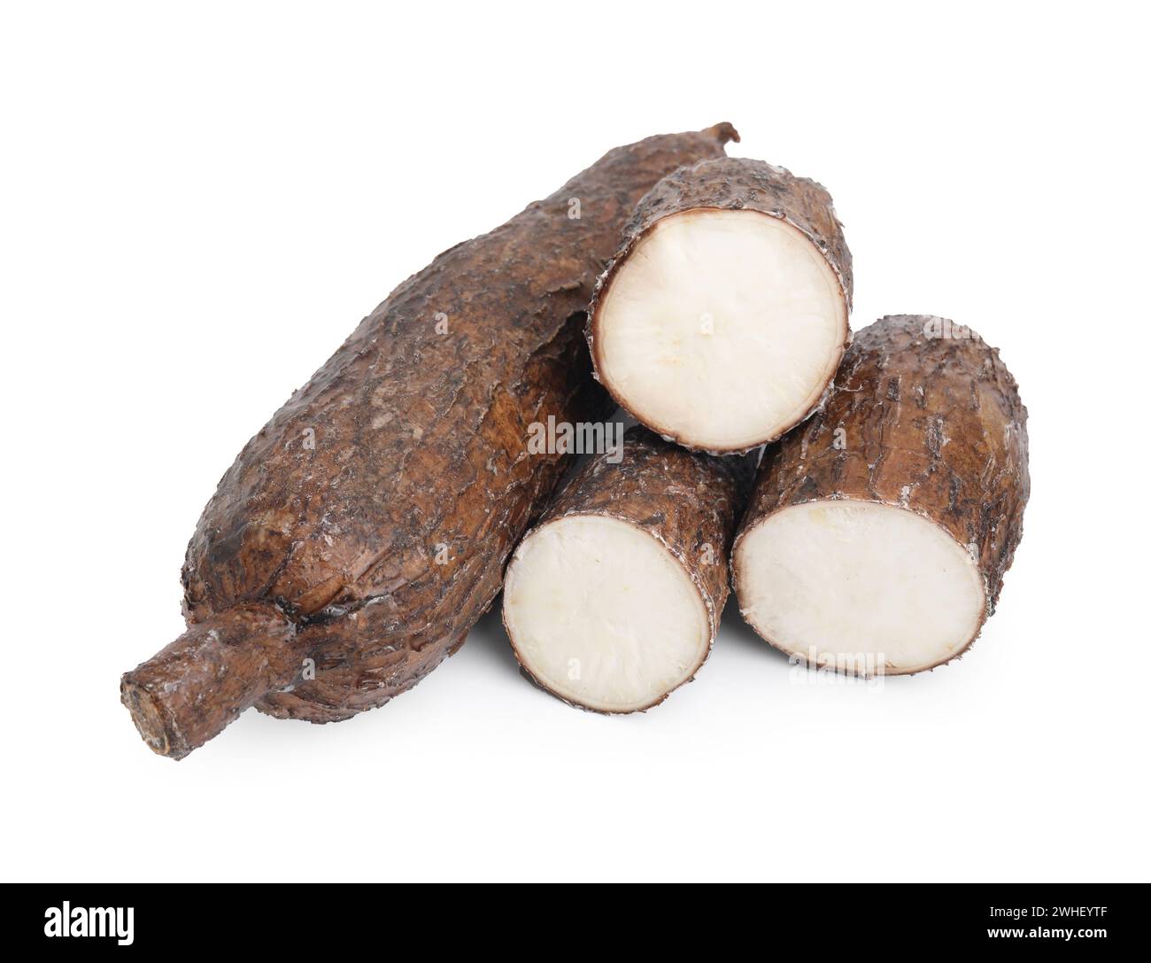 Whole and cut cassava roots isolated on white Stock Photo - Alamy