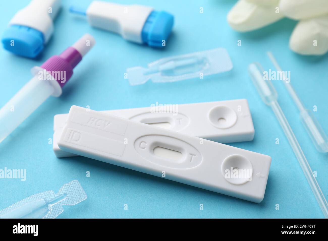 Disposable express test kits on light blue background, closeup Stock ...
