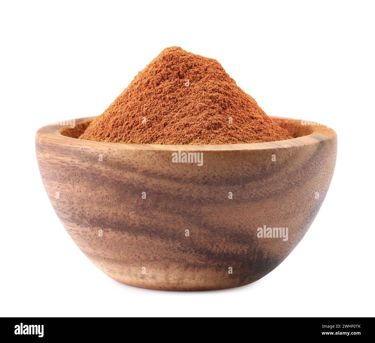 Dry aromatic cinnamon powder in wooden bowl isolated on white Stock ...