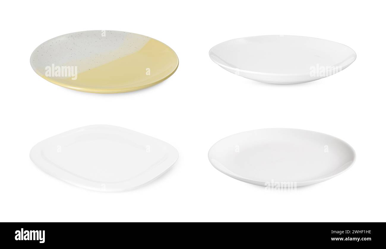 Different clean plates isolated on white, set Stock Photo - Alamy