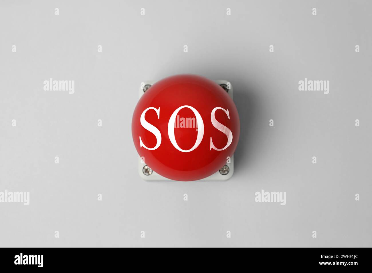 Red SOS button on white background. Space for text Stock Photo - Alamy
