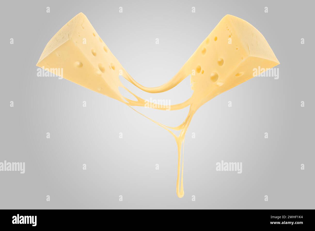 Tasty cheese stretching in air on grey background Stock Photo - Alamy