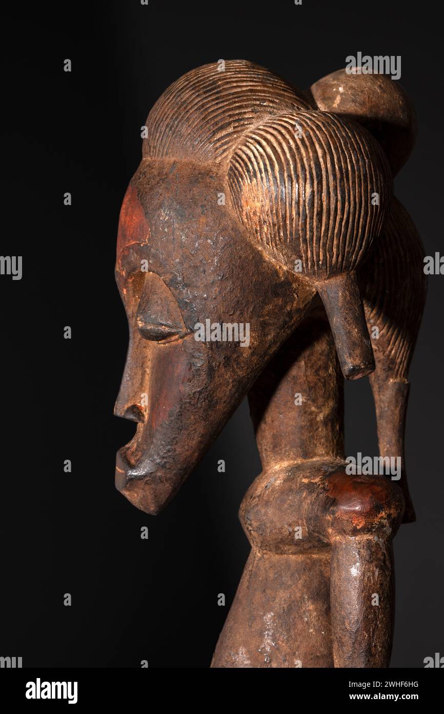 Close up of a wooden Senufo Male figure from Ivory Coast. Tribal ...