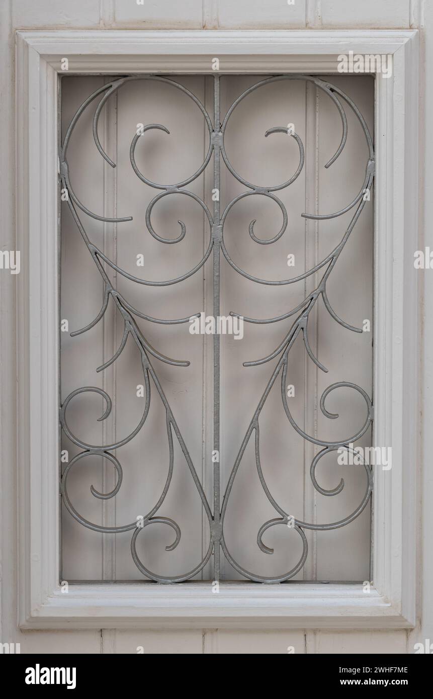 Window wrought iron grille Stock Photo - Alamy