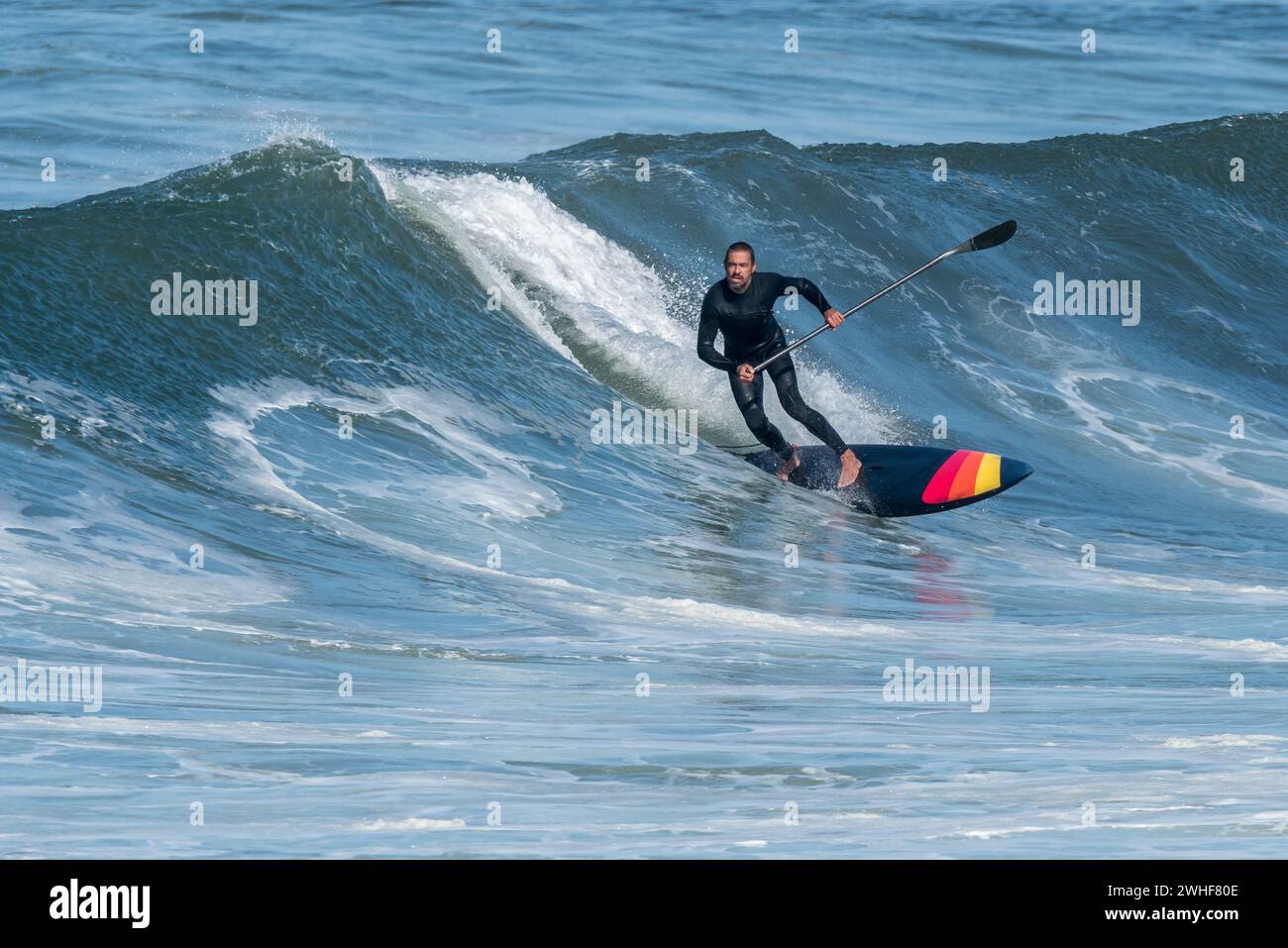 Stand up paddle surfer Stock Photo - Alamy