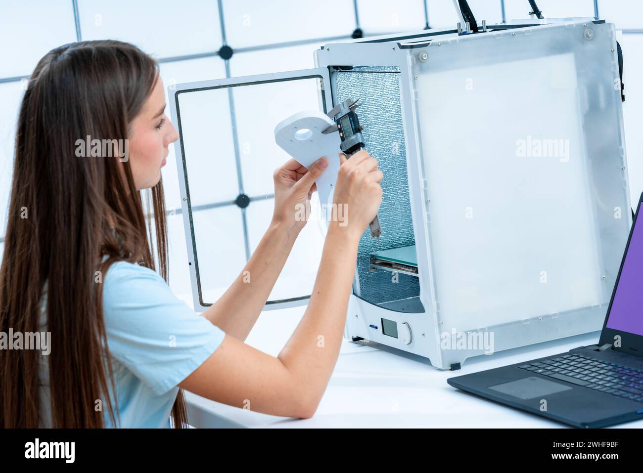 Scientist examining 3D print Stock Photo - Alamy