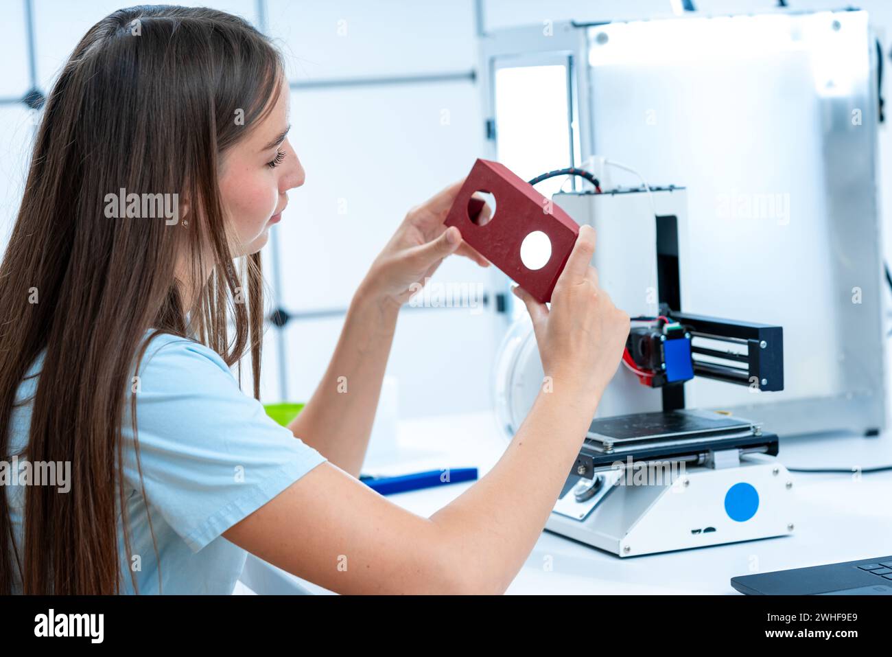 Scientist examining 3D print Stock Photo - Alamy
