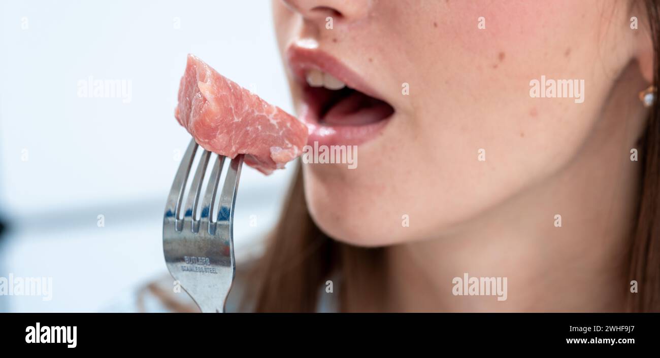 Woman eating red meat hi-res stock photography and images - Alamy Woman eating red meat hi-res stock photography and images - Alamy