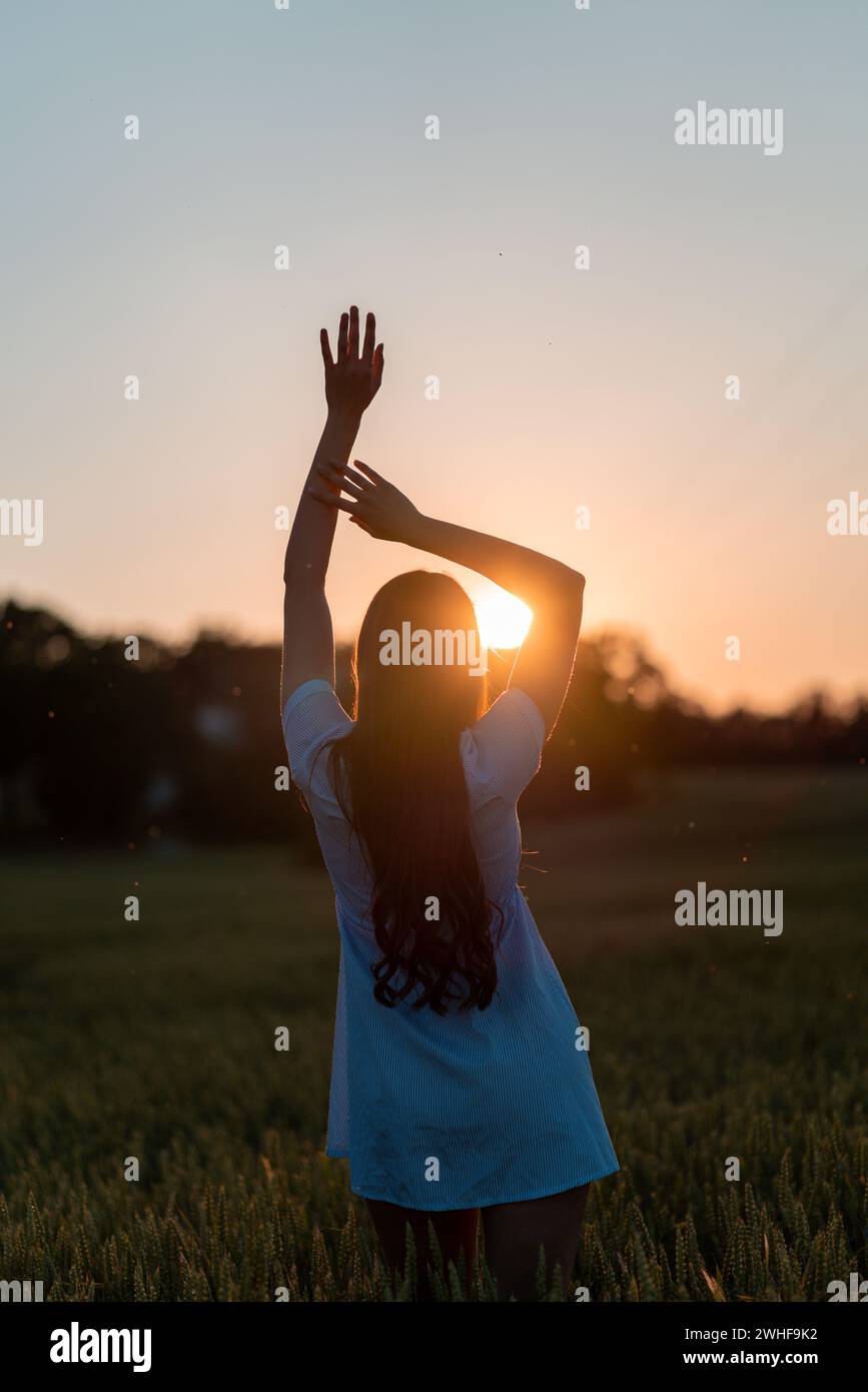 Posing at sunset hi-res stock photography and images - Alamy
