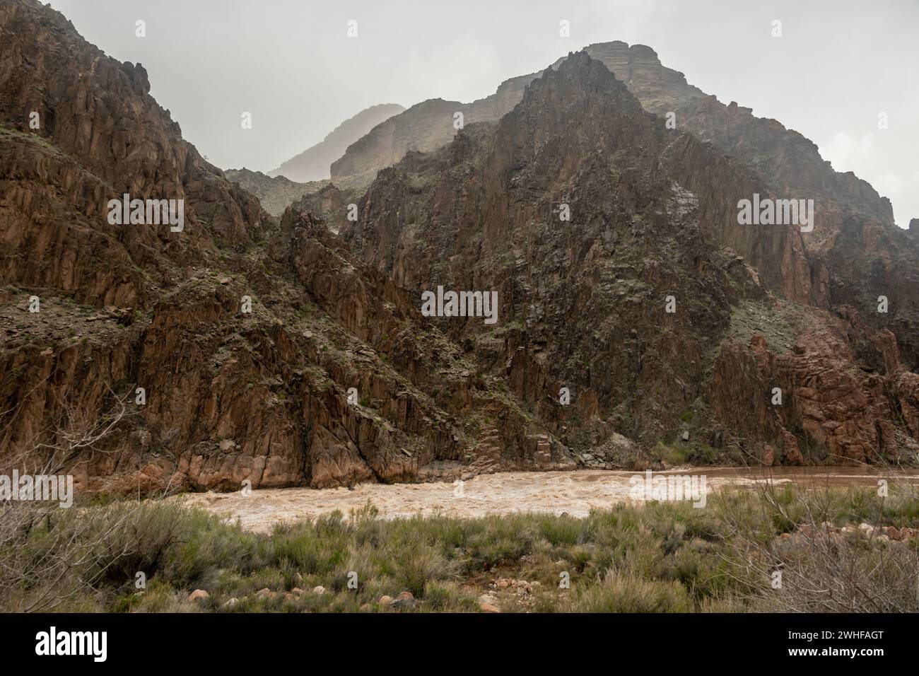 Snow Storm Passing Over Granite Rapids in the Grand Canyon Stock Photo ...