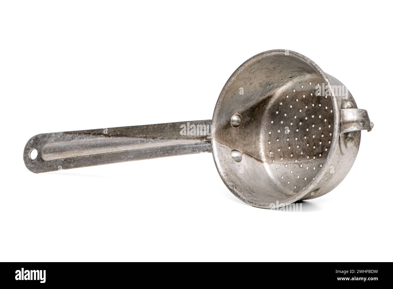 Old metal colander Stock Photo - Alamy