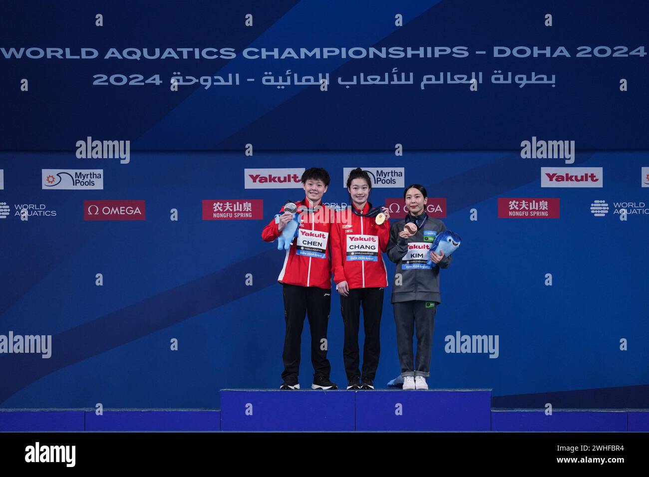 Doha, Kim Suji of South Korea pose for photos during the awarding ...