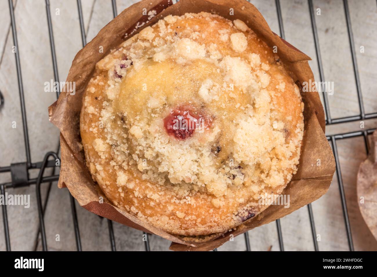 Muffins with red fruits jam fill Stock Photo - Alamy