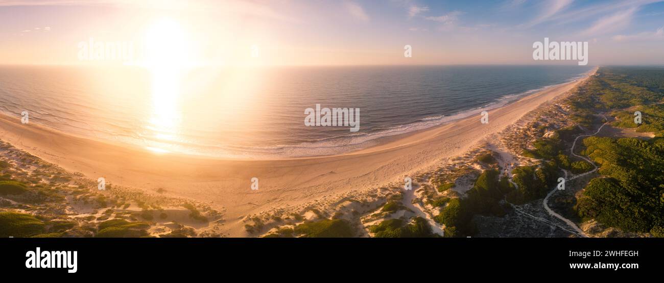 Aerial view of beach at sunset Stock Photo - Alamy
