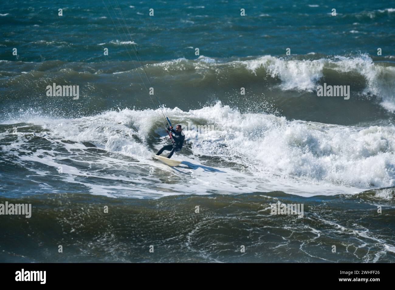 Kitesurfer riding the waves hi-res stock photography and images - Alamy