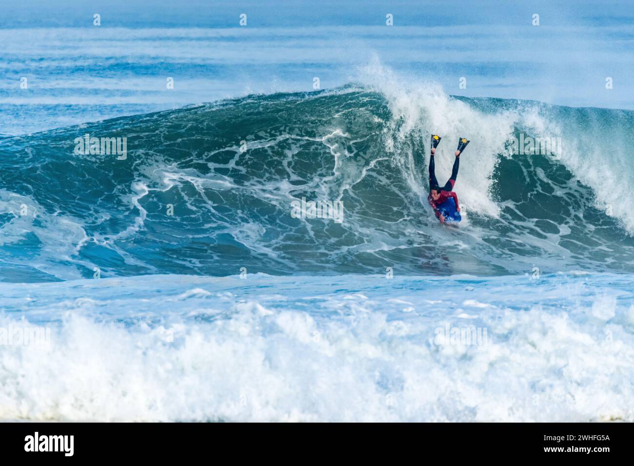 Bodyboarder surfing ocean wave Stock Photo - Alamy