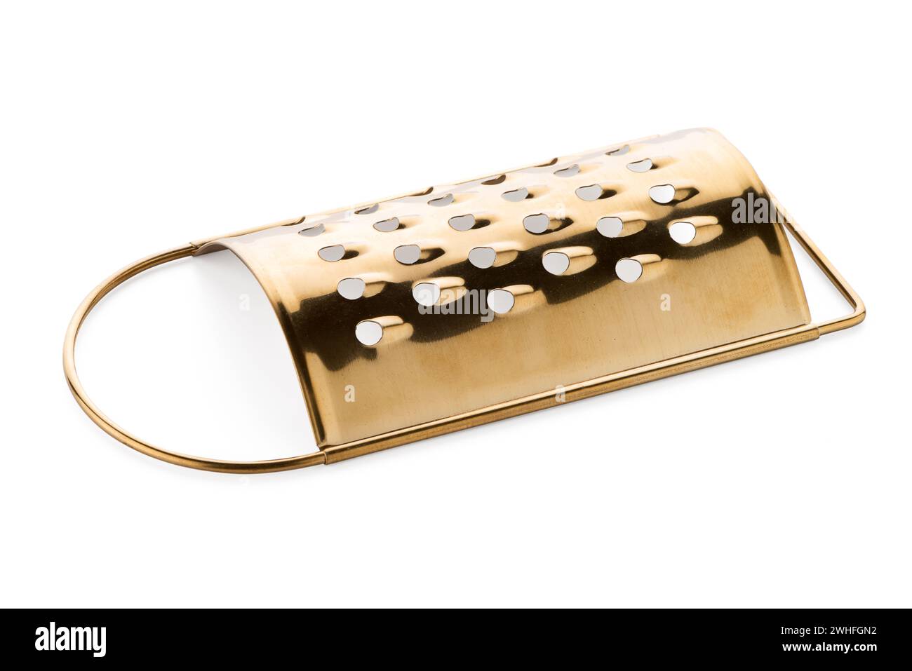 Golden colored metal scraper Stock Photo - Alamy