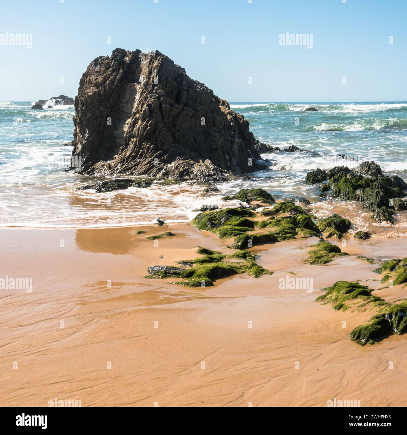 Beach with rocks in Almograve Stock Photo - Alamy