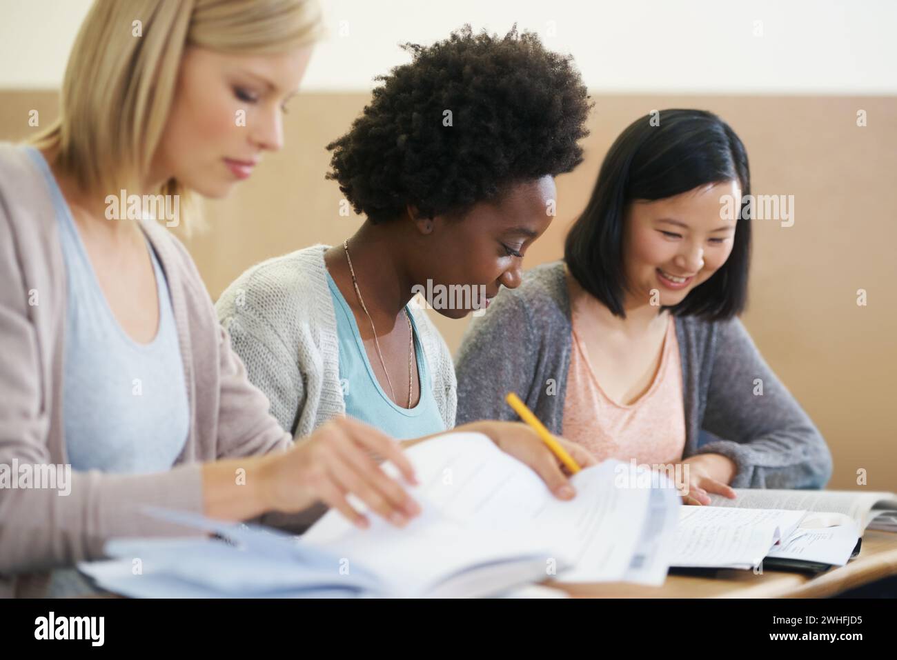 Students, friends and paperwork in university lecture for learning ...
