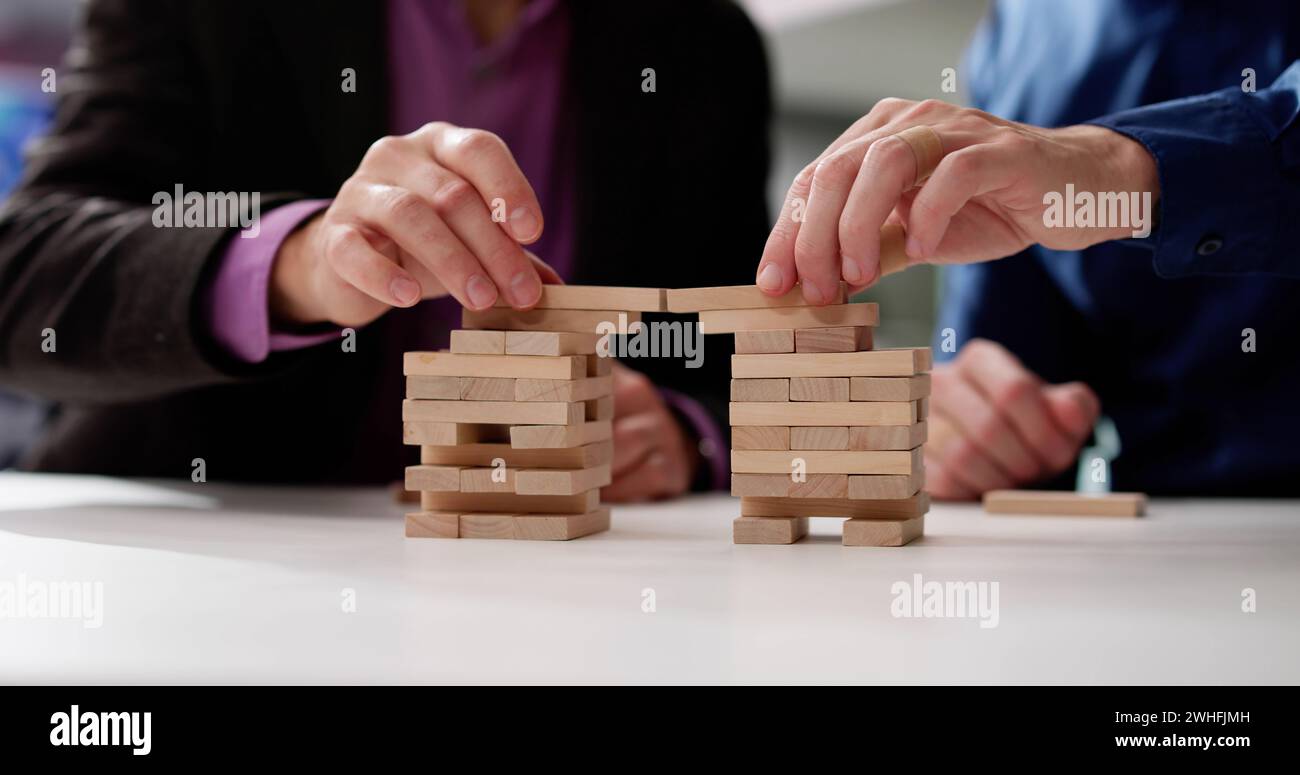 Bridge Building Using Wooden Blocks. Closing Gap Stock Photo - Alamy