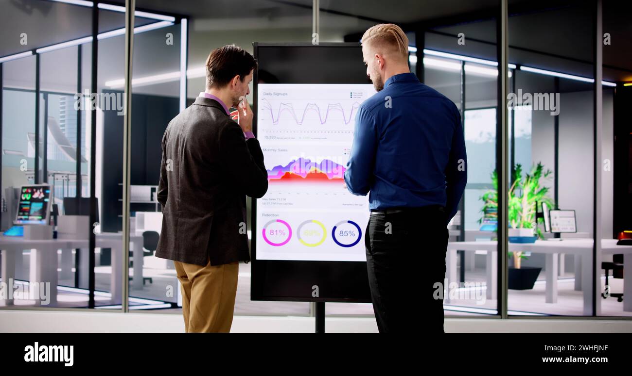 Corporate Business Presentation In Office On TV Stock Photo - Alamy