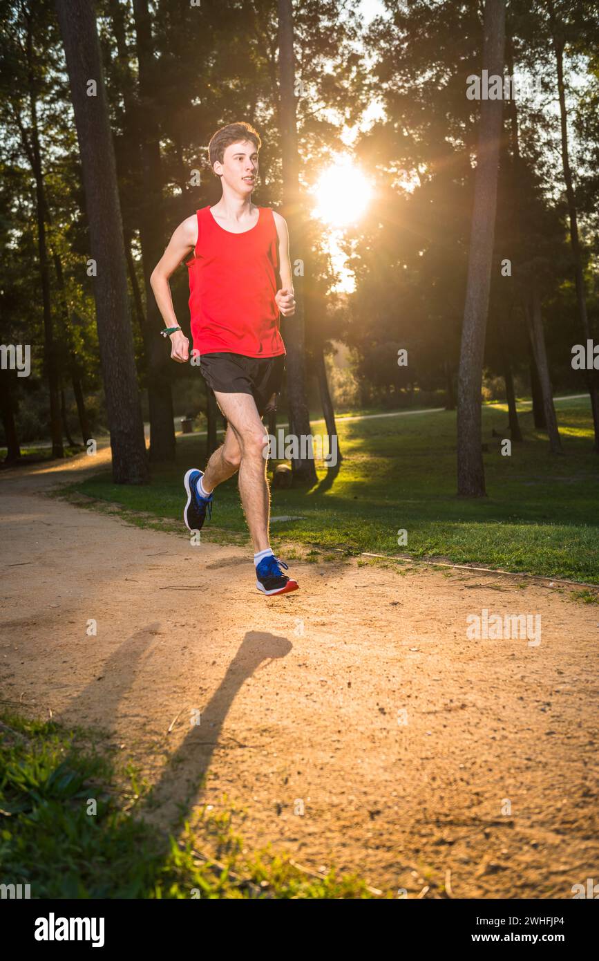 Athletic man running sunset hi-res stock photography and images - Alamy