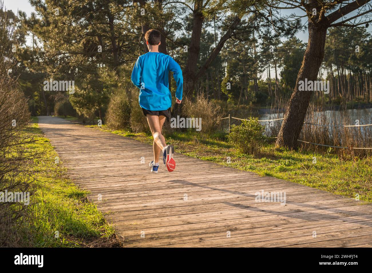 Young man running outdoor hi-res stock photography and images - Alamy