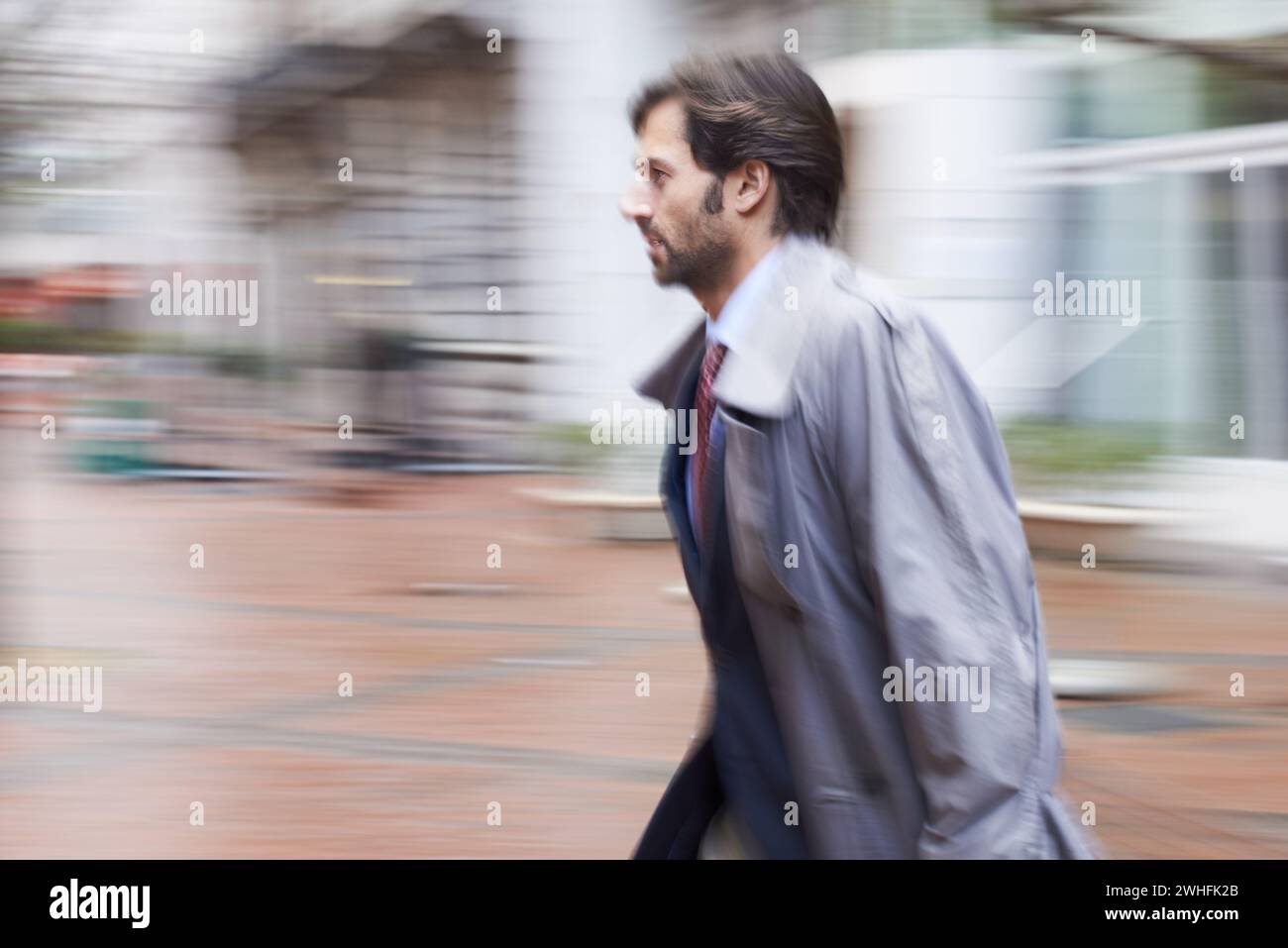 Employee, rush and stress in city for work in corporate company, late ...