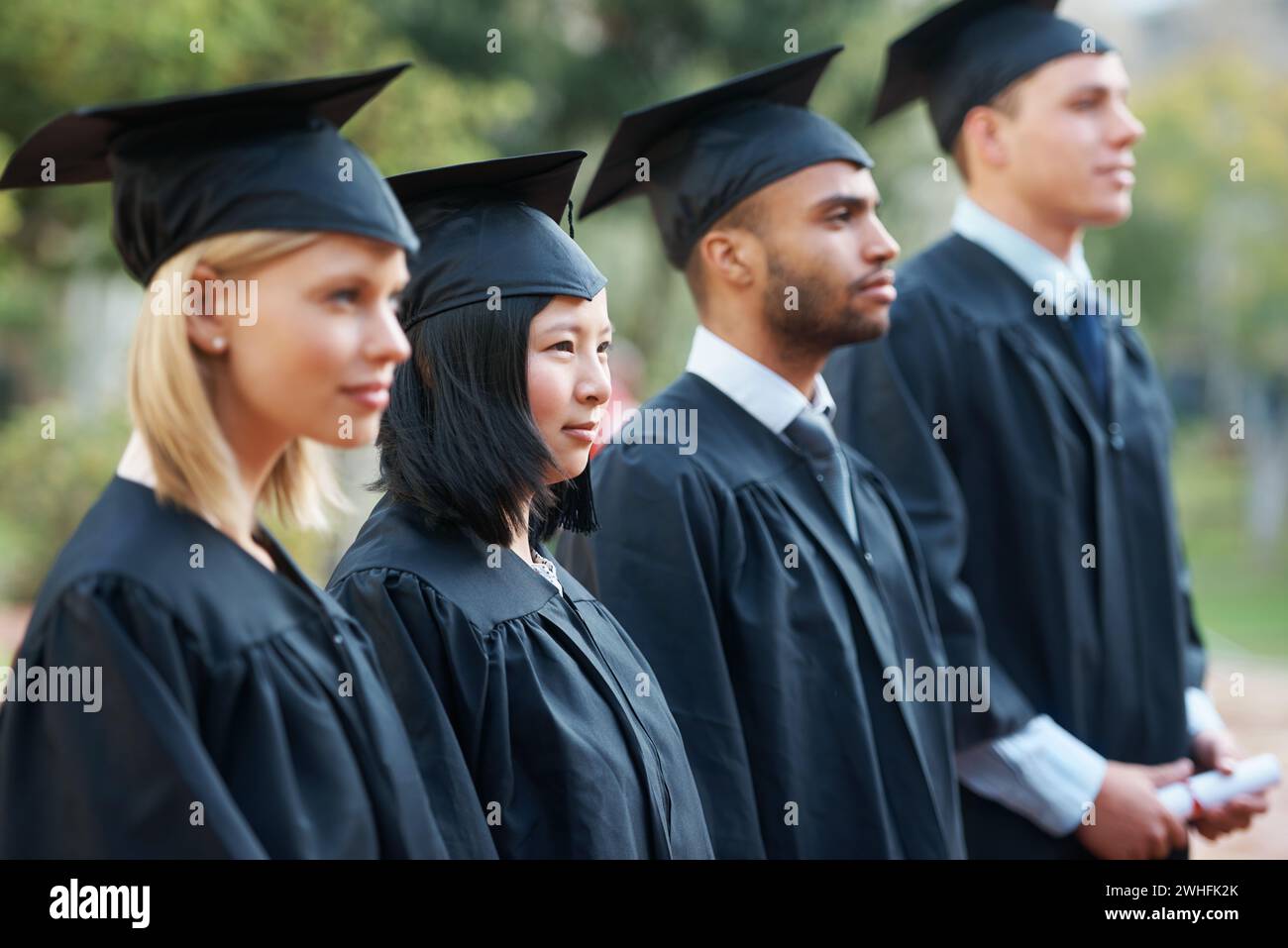 Line, graduation and students in college or university to celebrate ...