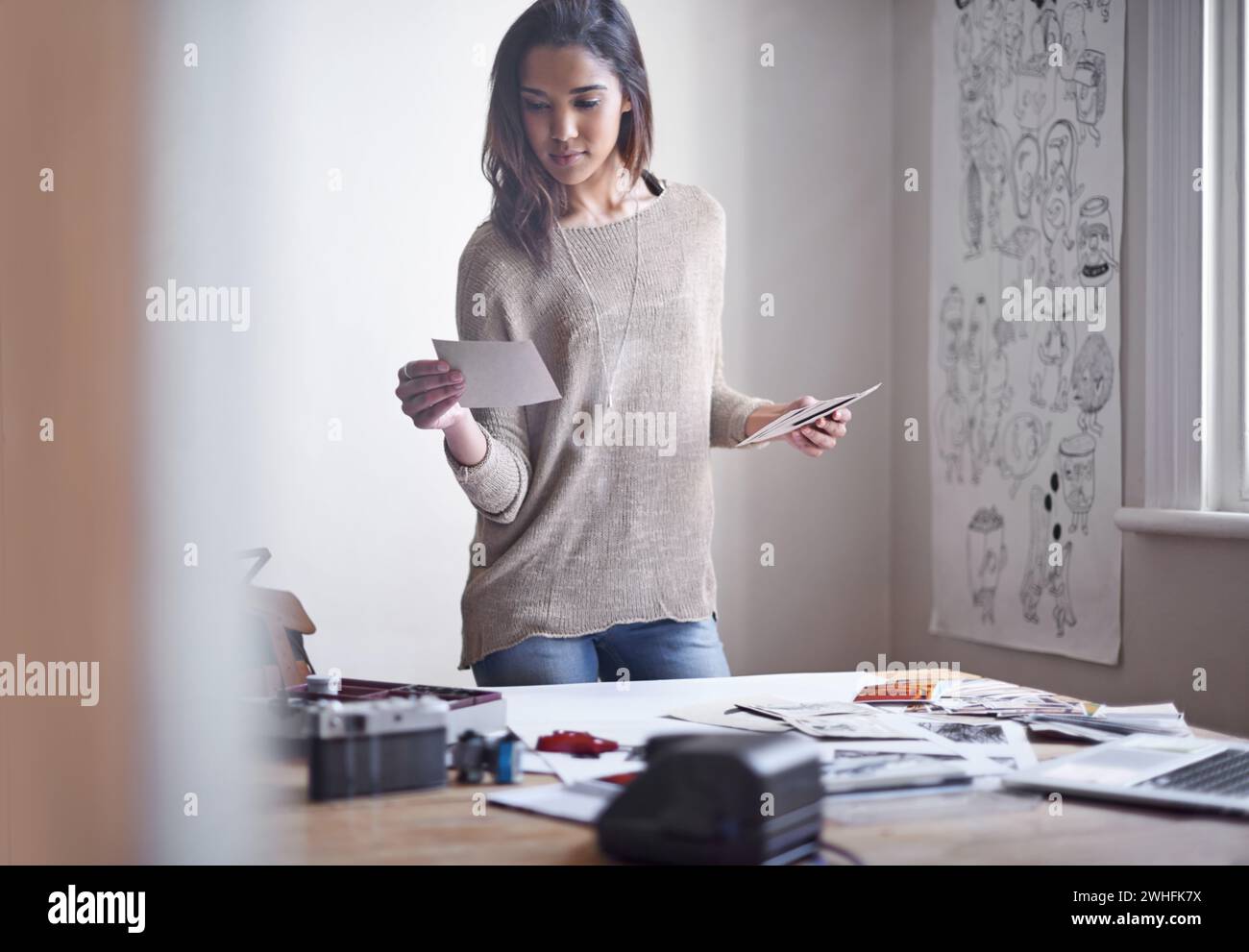 Woman, visual artist and office with picture for portfolio, inspiration ...