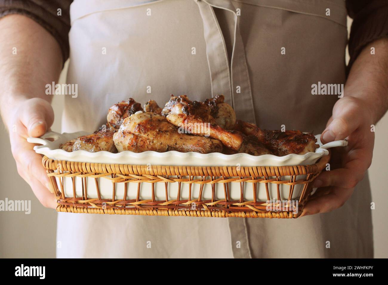 Hands holding chicken hi-res stock photography and images - Alamy