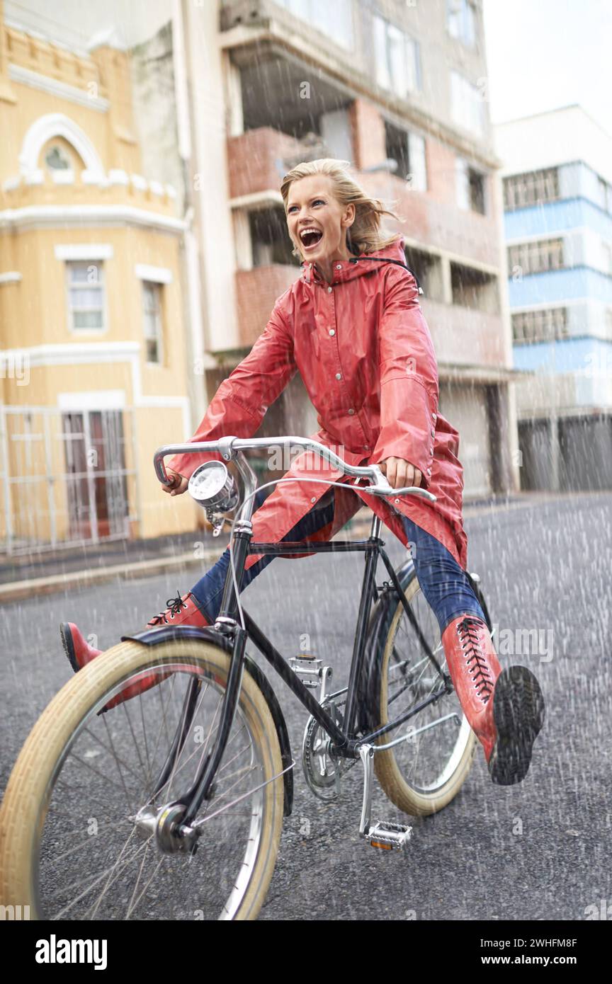 Woman, rain and city with vintage bicycle for eco friendly ...