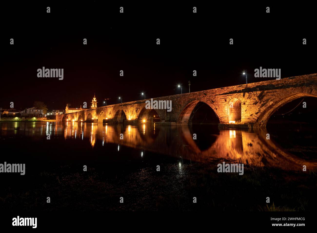 Bridge crossing the Rio Lima at night Stock Photo - Alamy