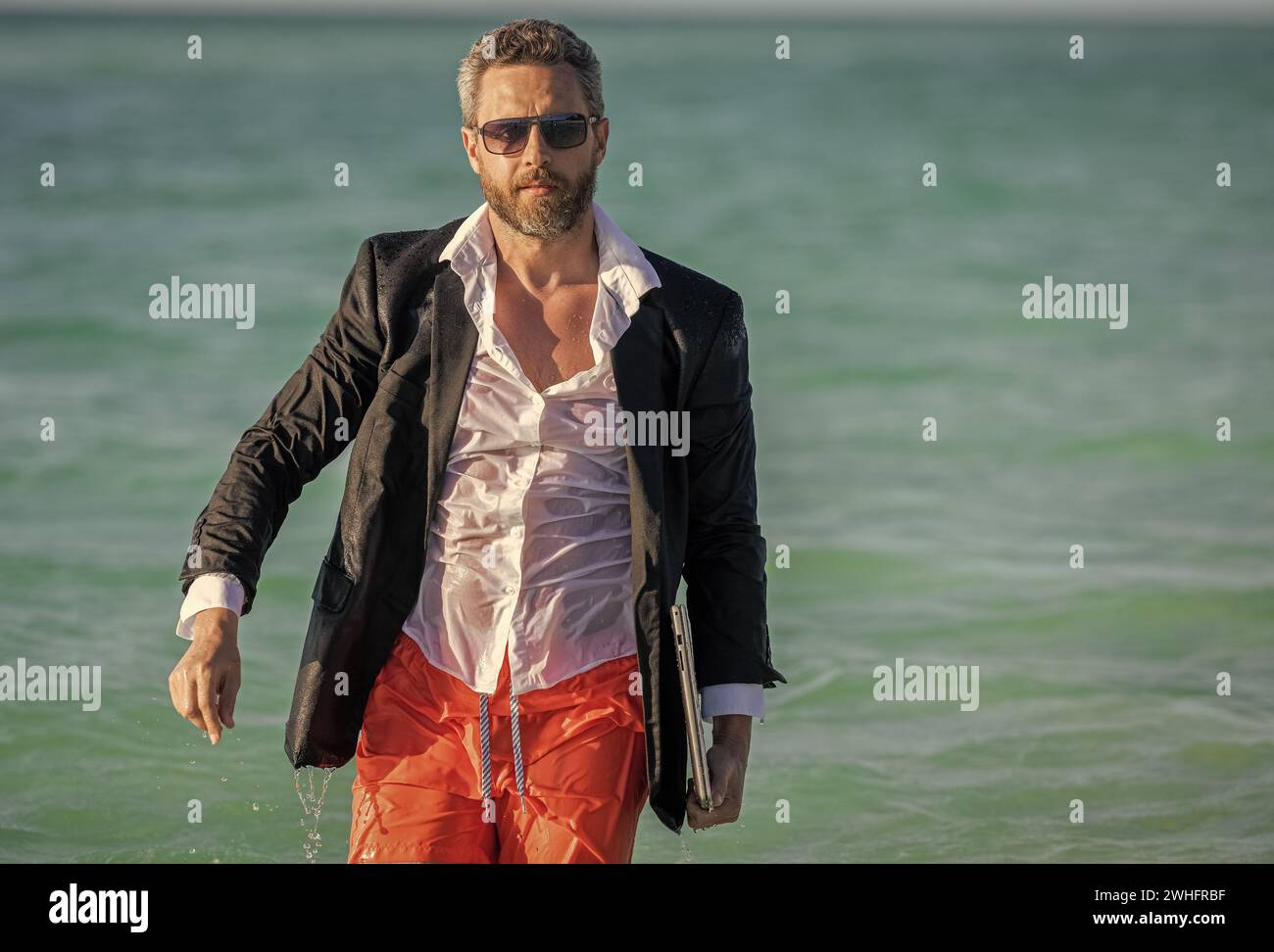 business boss spending weekend at the beach. Businessman boss suit ...