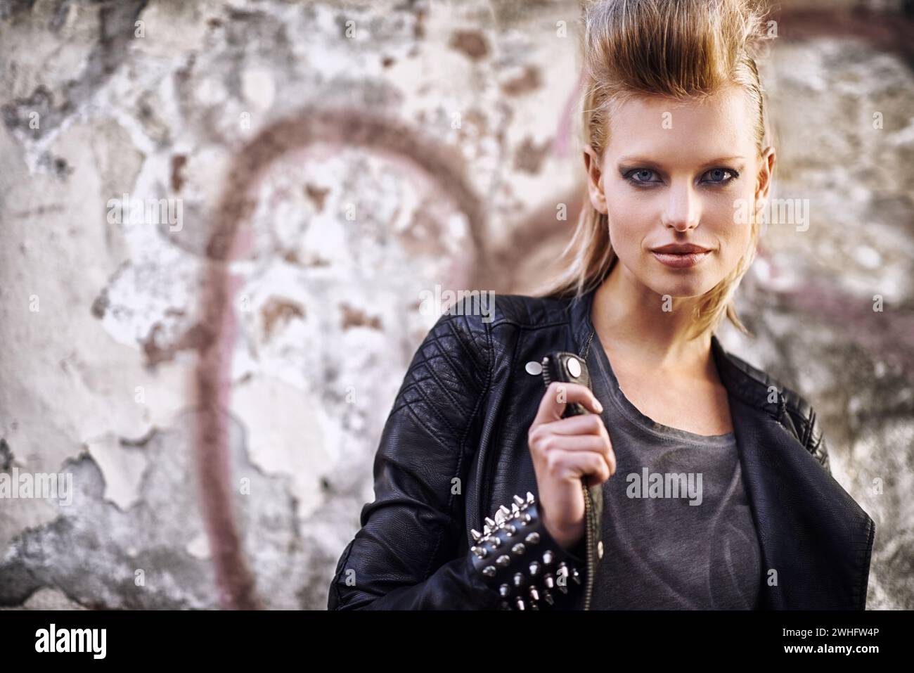 Woman, portrait and confident in edgy fashion with punk rock hairstyle ...