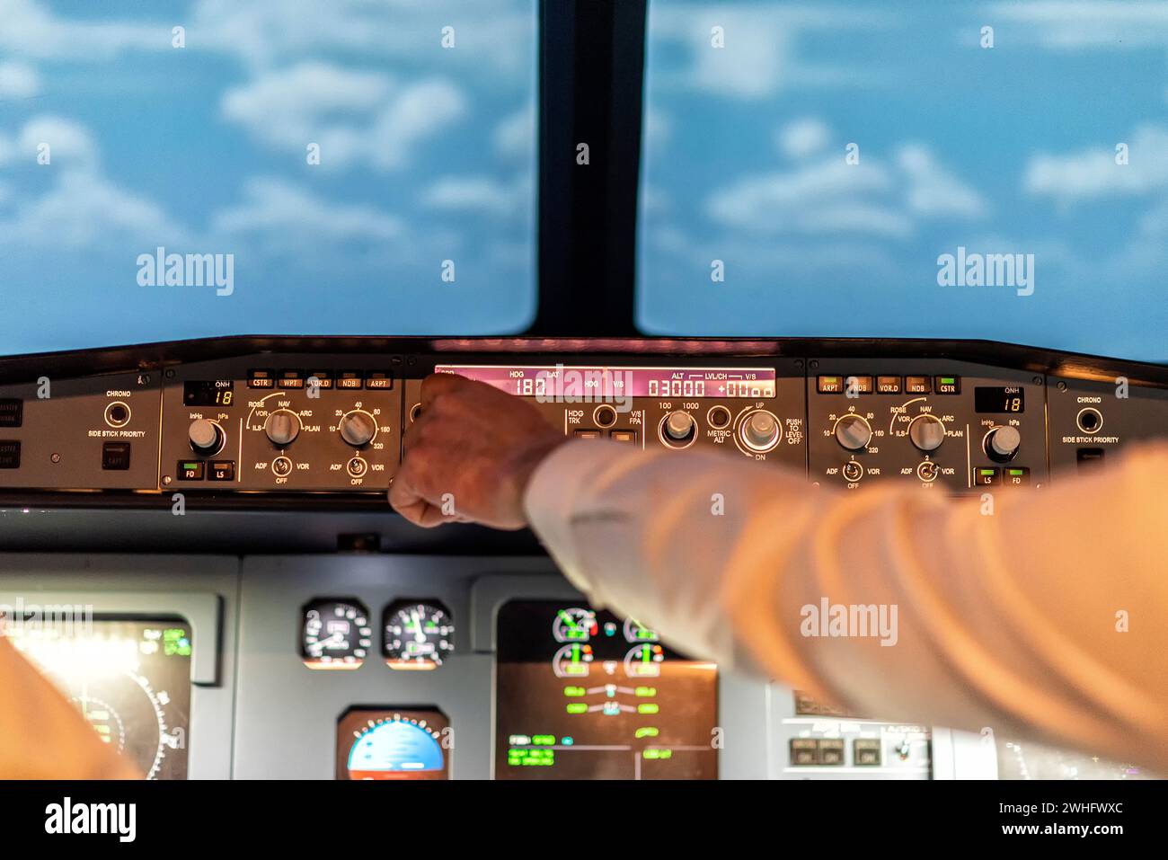 Pilots in a cockpit in an airplane Stock Photo - Alamy