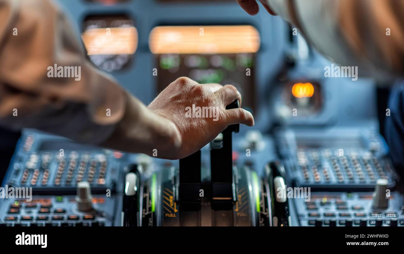 Pilots in a cockpit in an airplane Stock Photo - Alamy