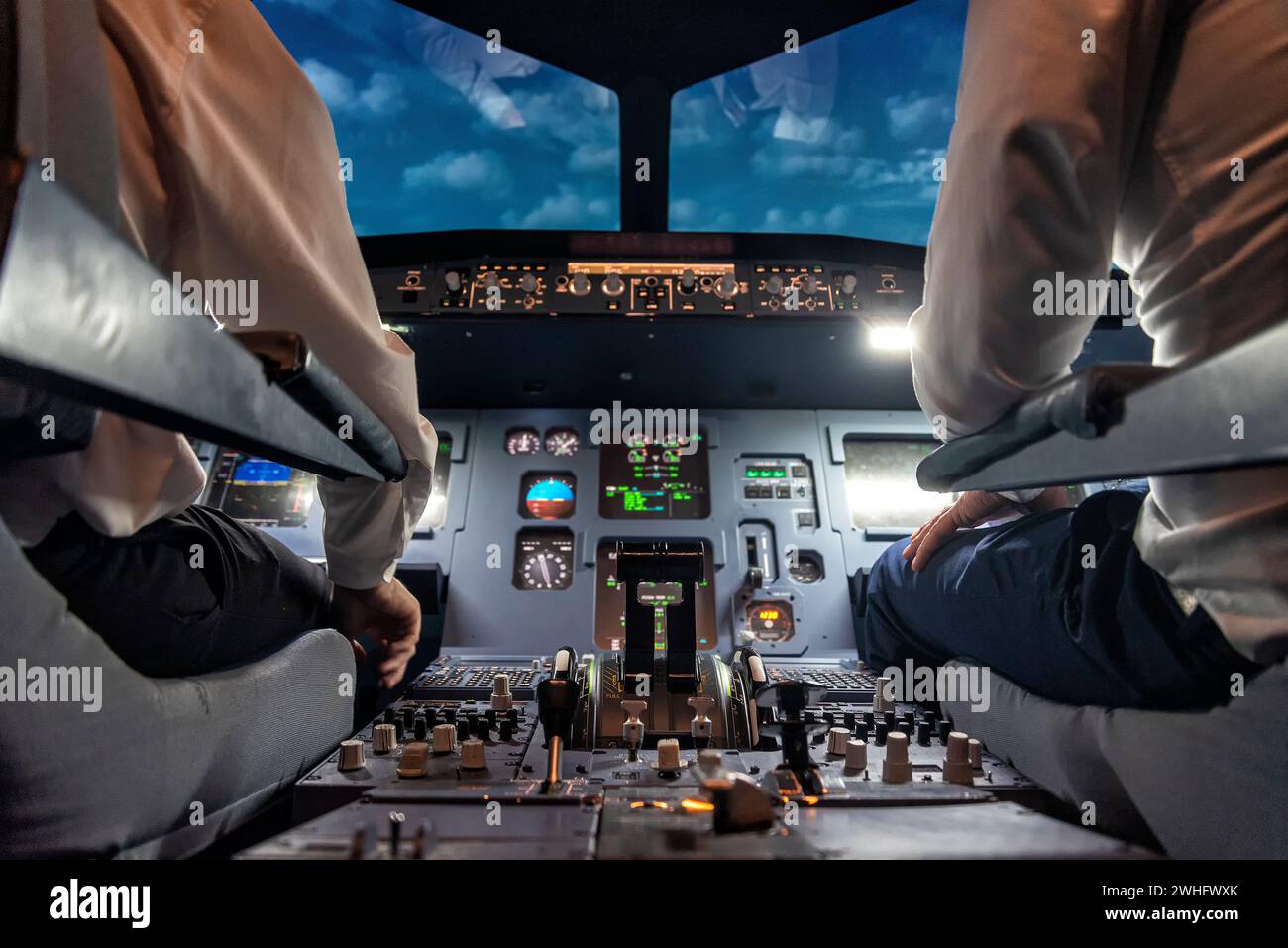 Pilots in a cockpit in an airplane Stock Photo - Alamy