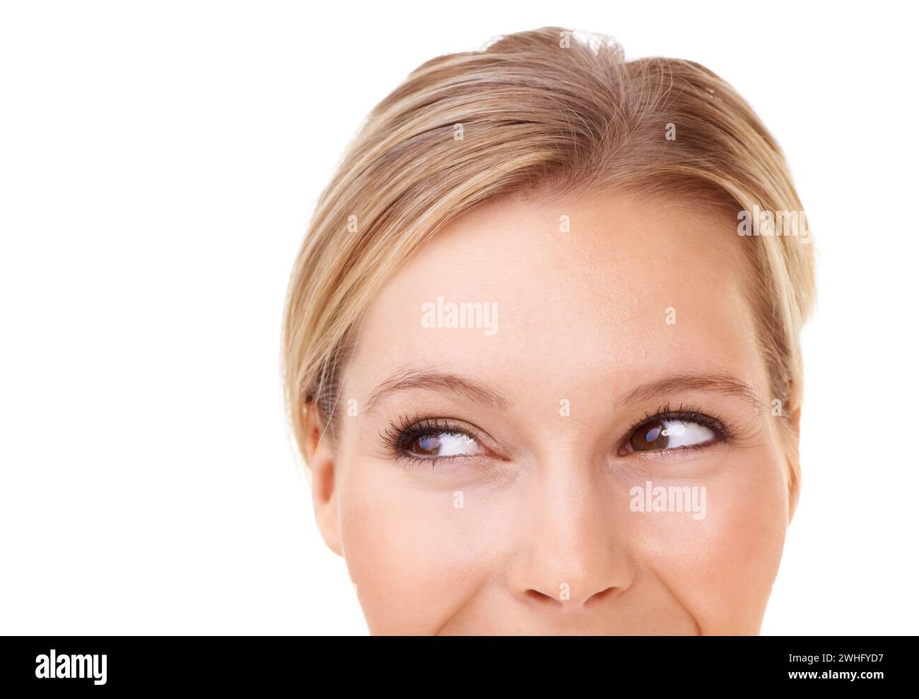 Woman, face and eyes while thinking of idea against white background ...