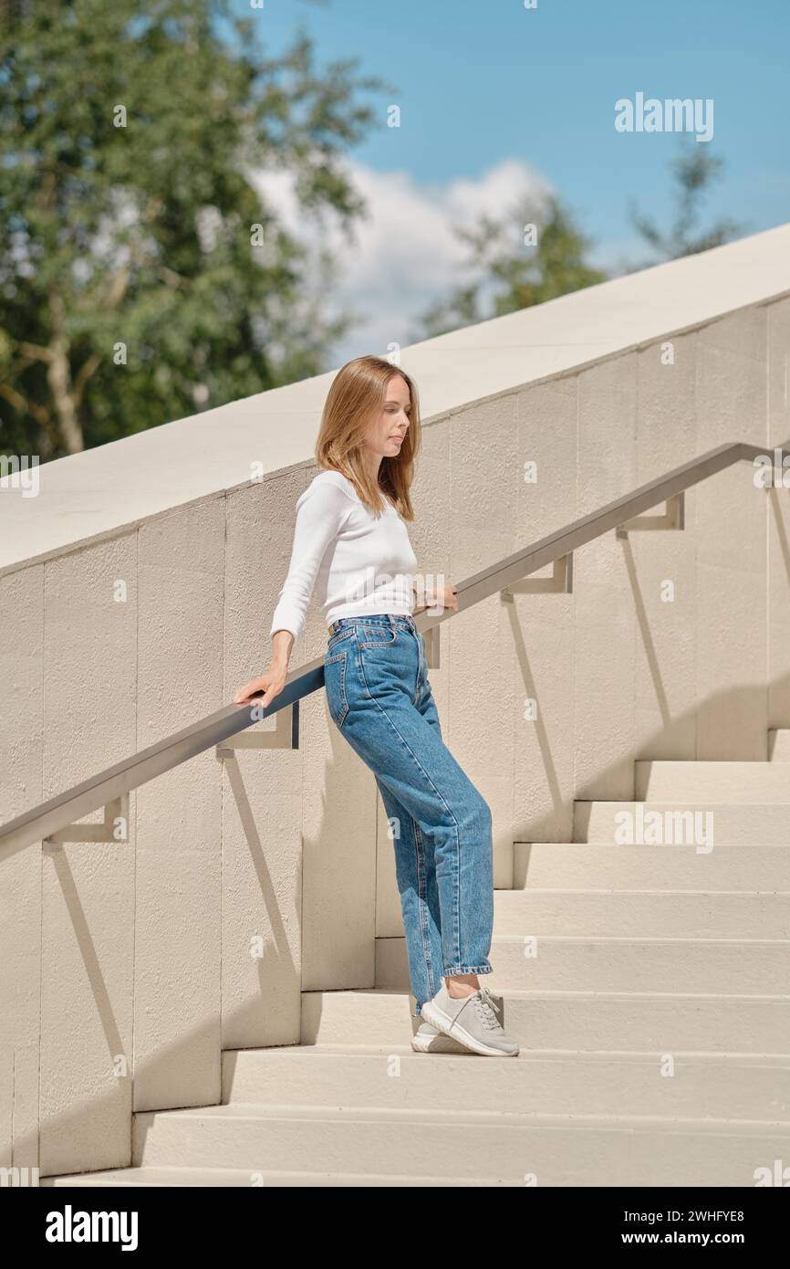Full length woman standing railing hi-res stock photography and images ...