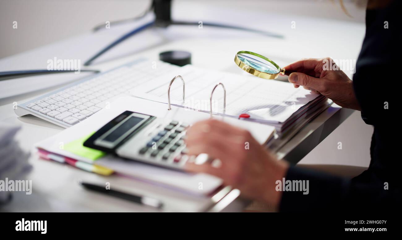 Tax papers with magnifying glass hi-res stock photography and images ...