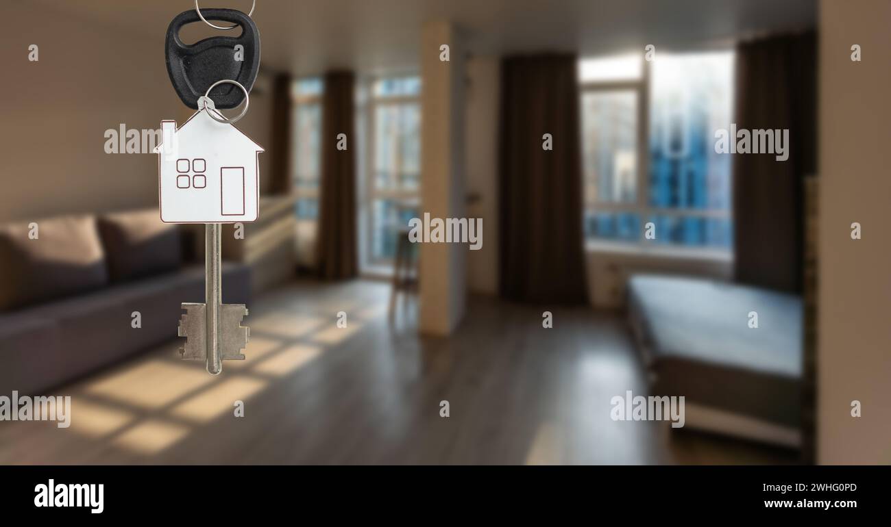 Open door with keys, key in keyhole Stock Photo - Alamy