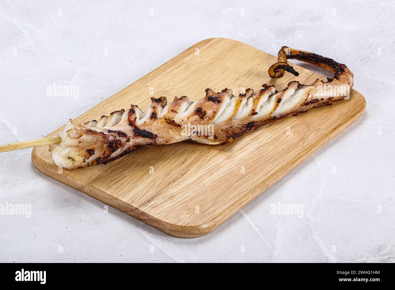 Delicous tasty Grilled octopus tentacle snack Stock Photo - Alamy