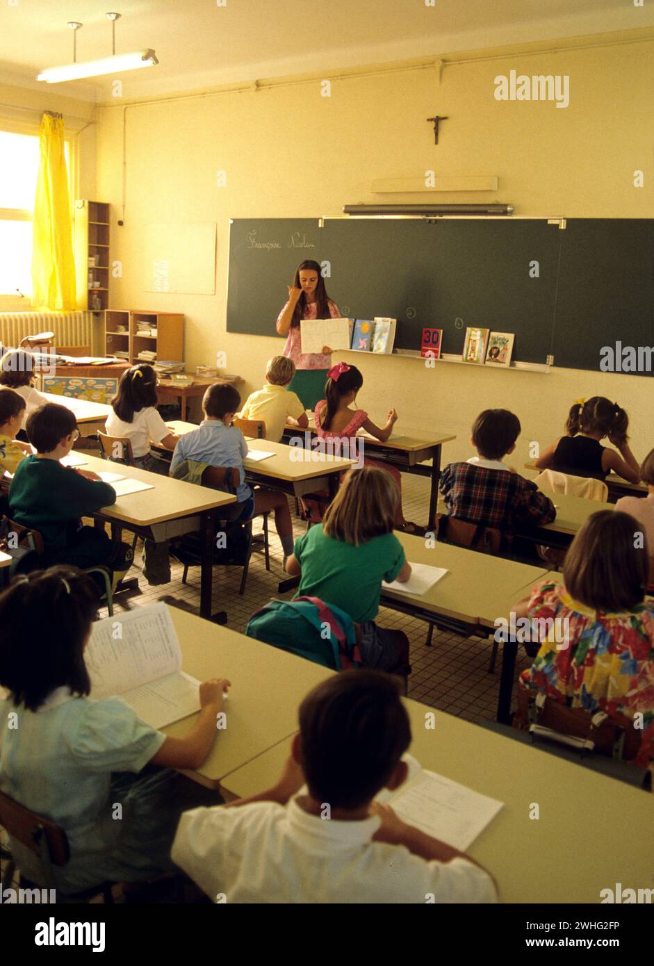 french primary school teacher with young students Stock Photo - Alamy