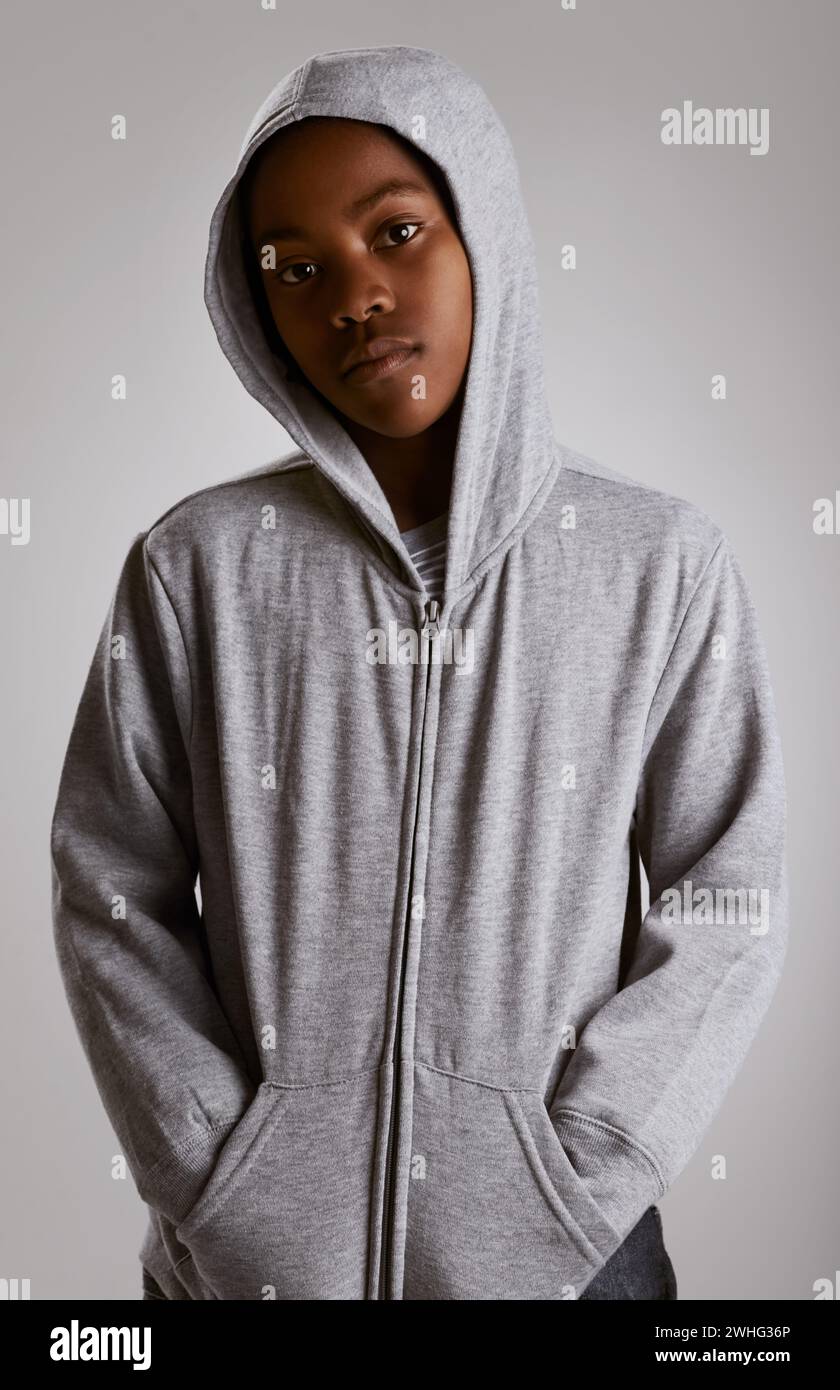 Fashion, portrait and teenager in hoodie at studio with serious kid in ...