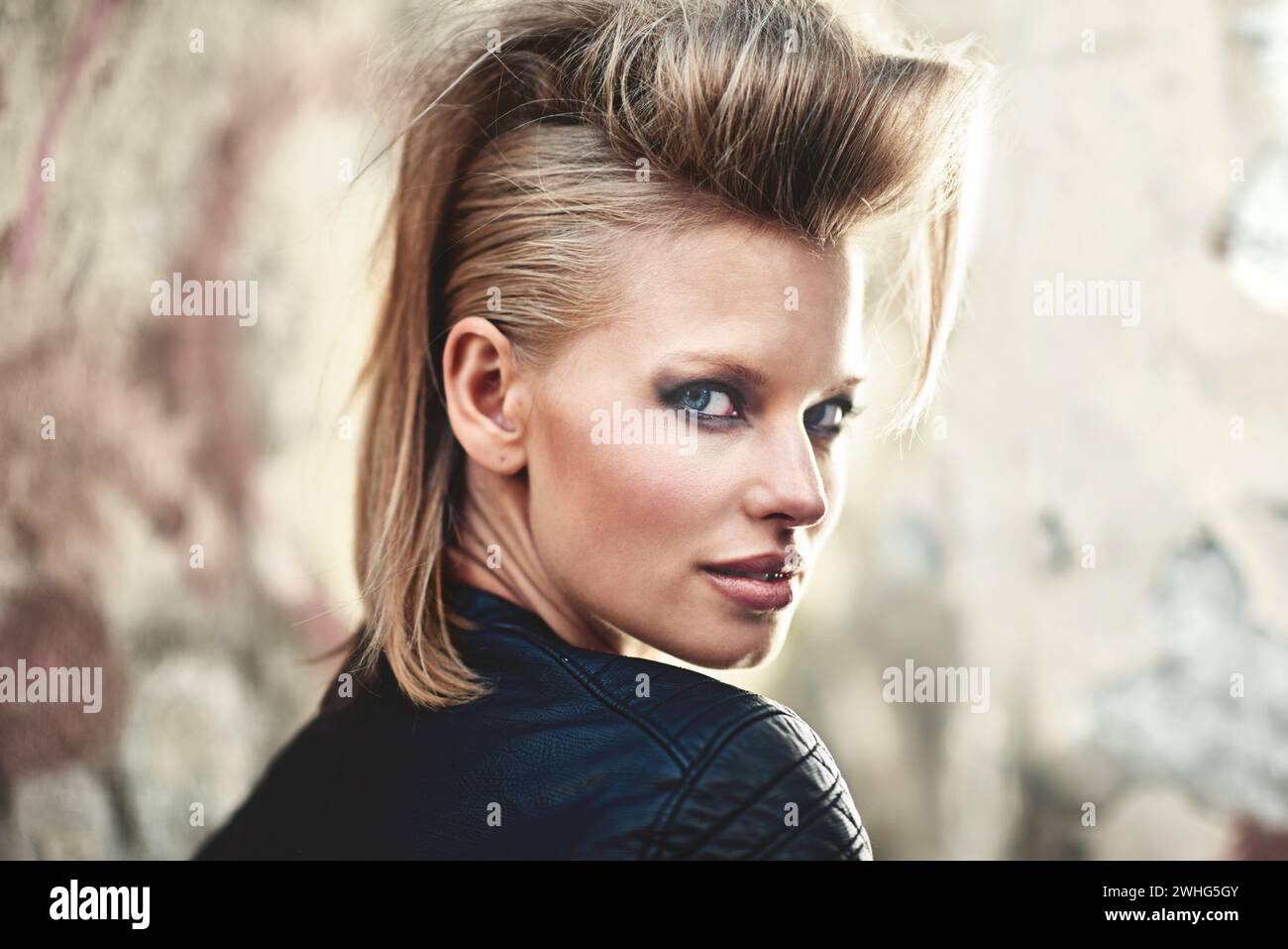 Woman, portrait and happy in edgy fashion with punk rock hairstyle ...