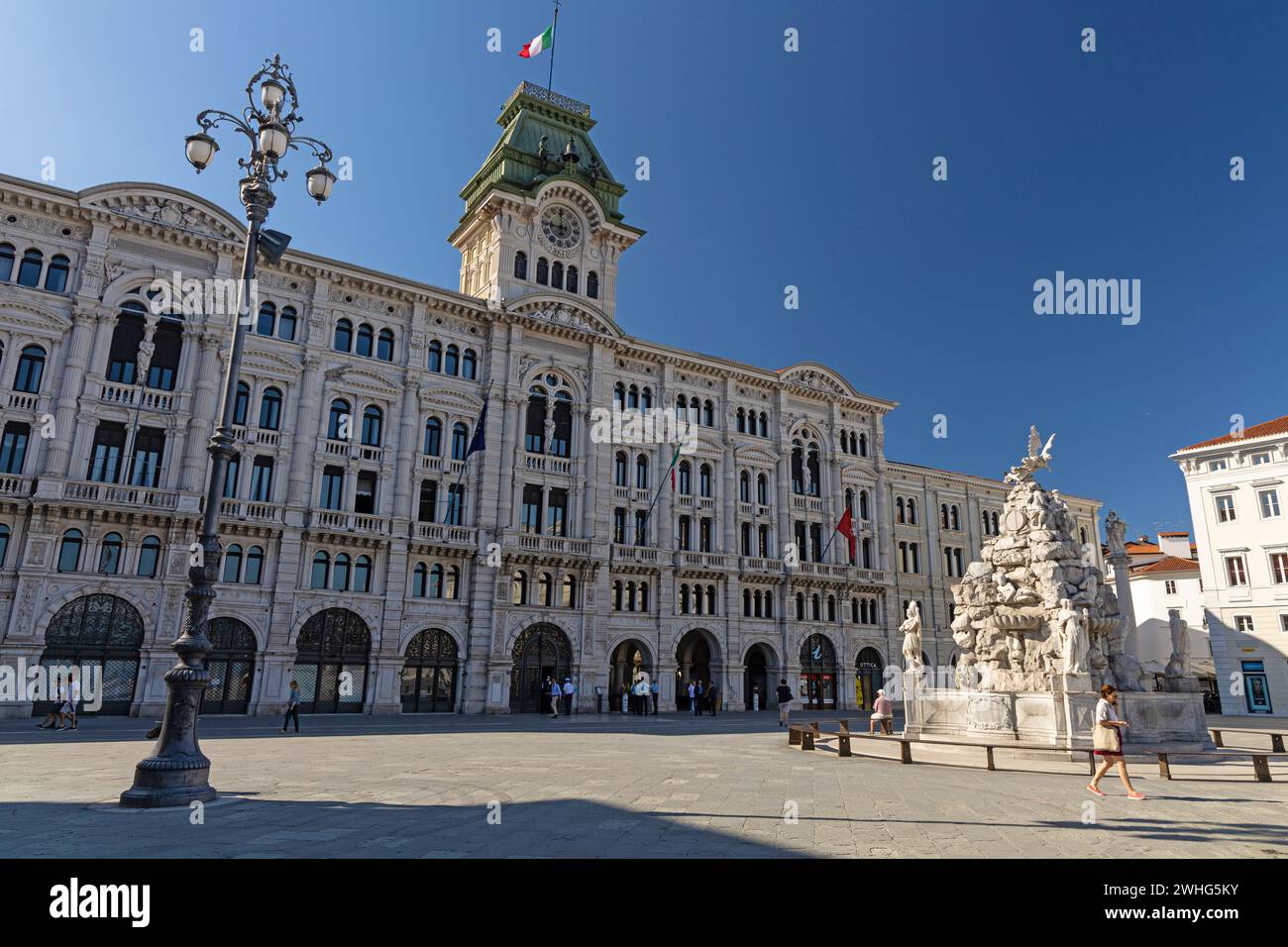 Town hall building and fountain of the four continents in Trieste Stock ...